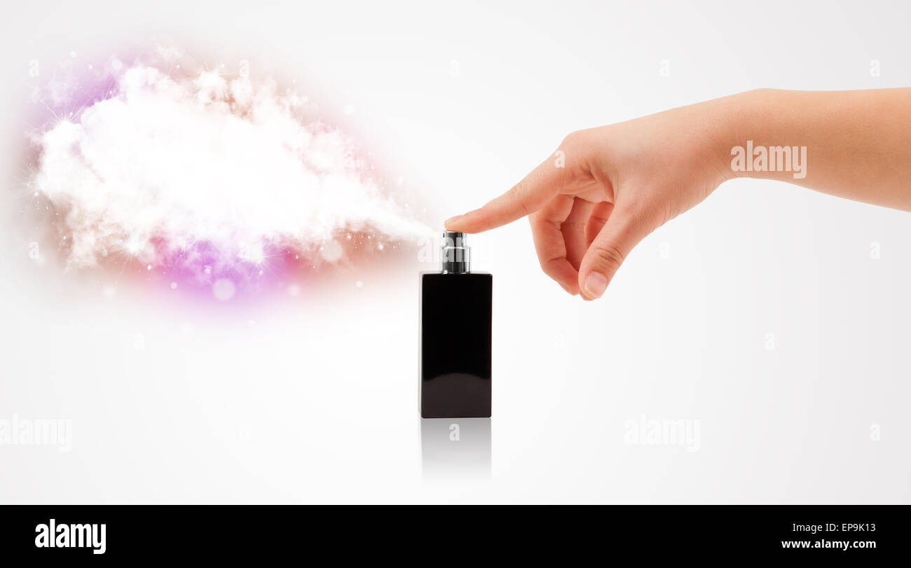 woman hands spraying colorful cloud Stock Photo - Alamy