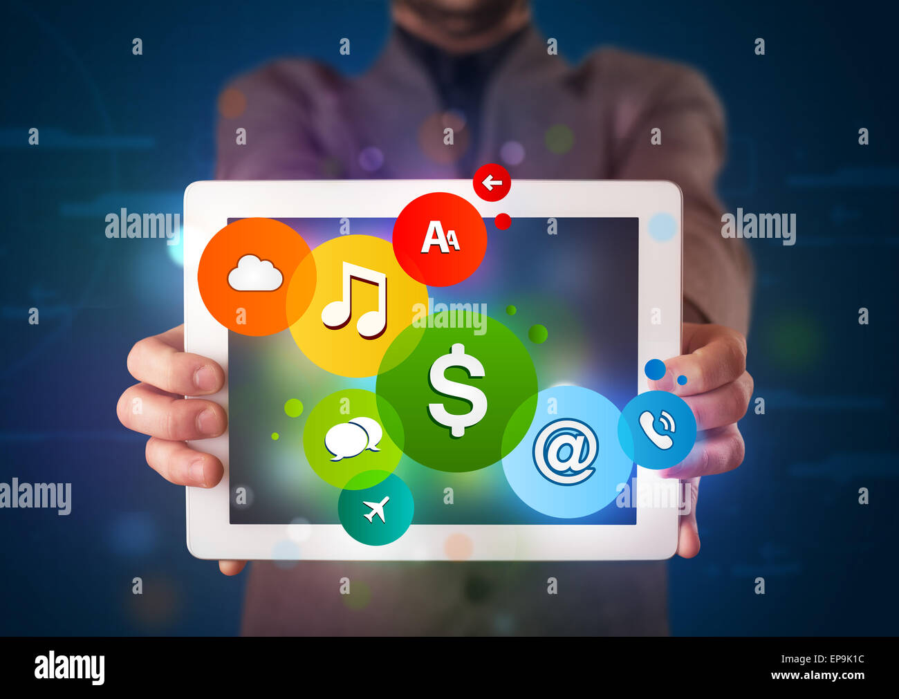 Businessman presenting colorful modern signs Stock Photo - Alamy