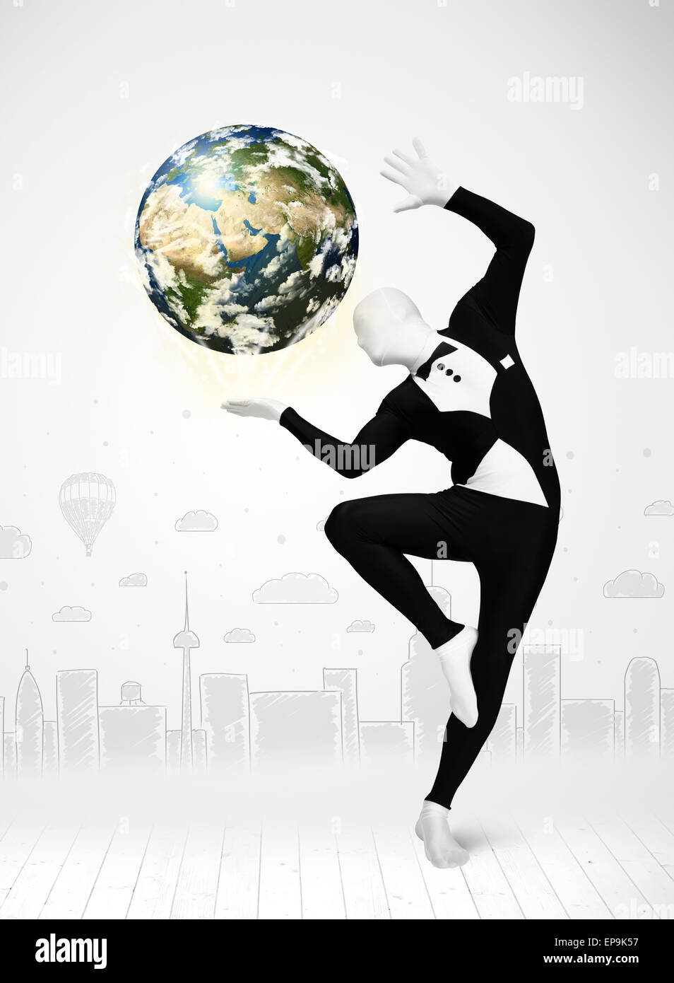 man in full body suit holding planet earth Stock Photo - Alamy