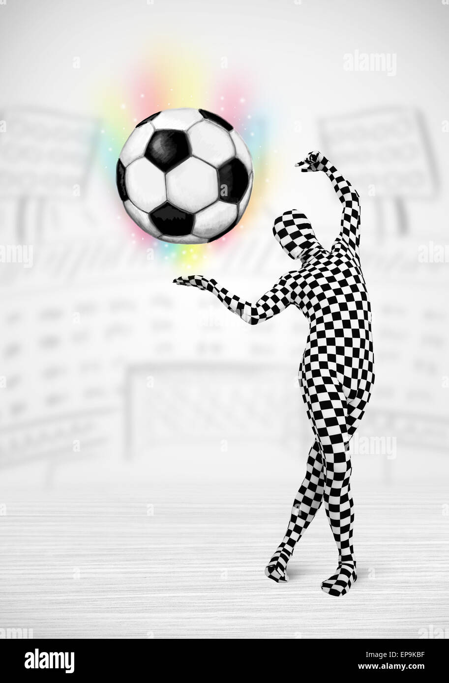man in full body suit holdig soccer ball Stock Photo - Alamy