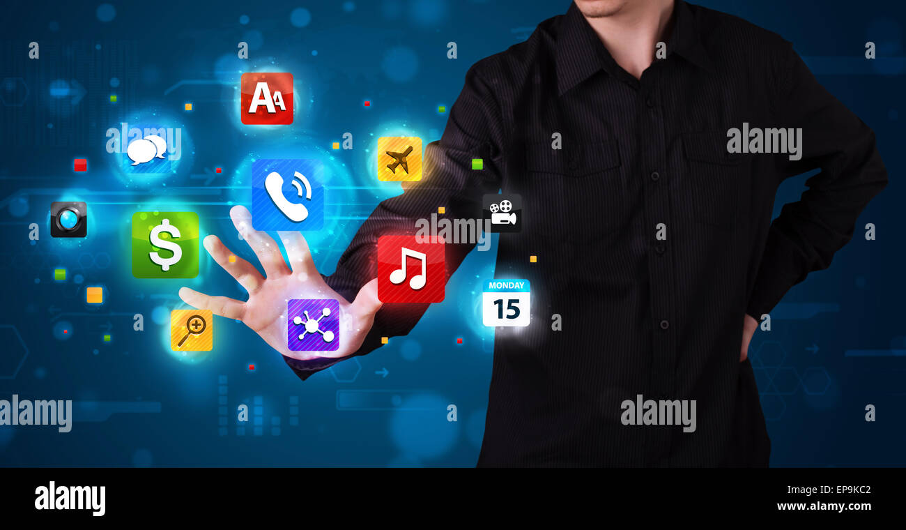 Man pressing various collection of high tech buttons Stock Photo - Alamy