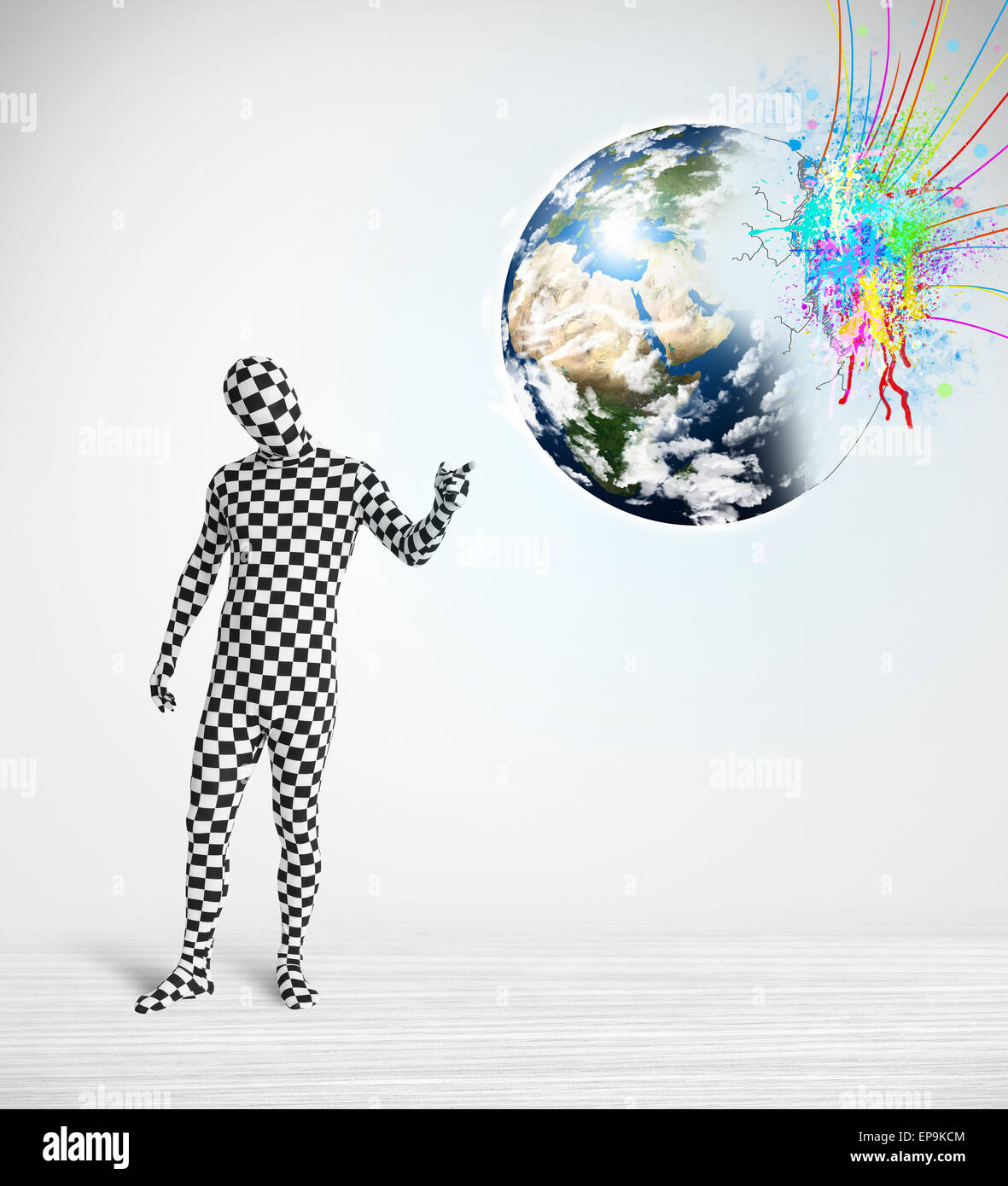 Funny man in body suit looking at colorful splatter earth Stock Photo ...