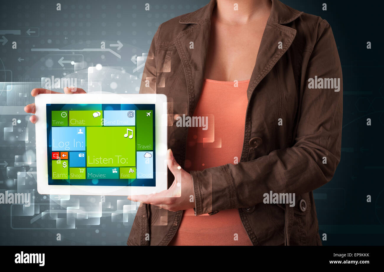 Lady holding tablet with modern software operational system Stock Photo ...