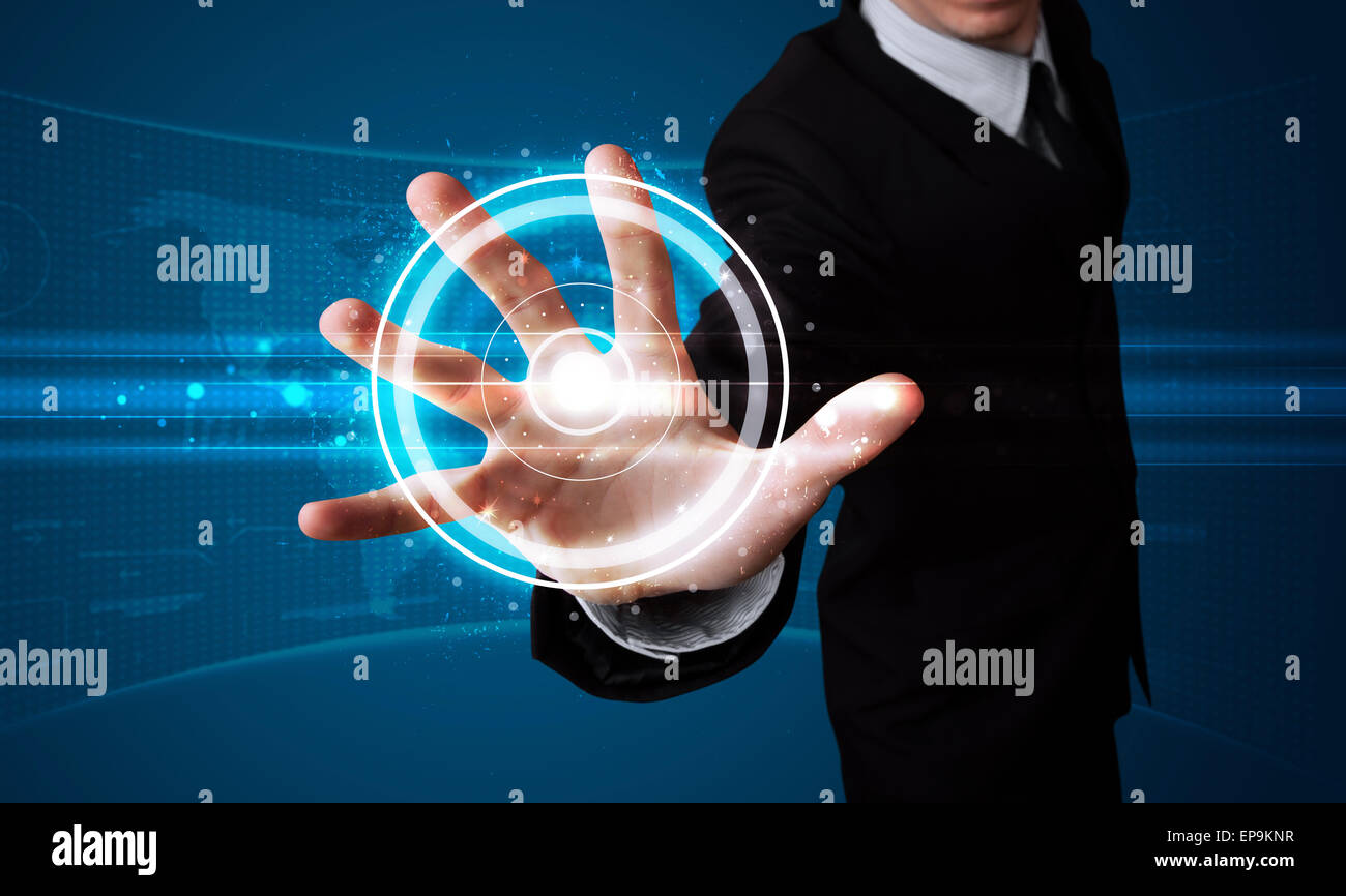 Businessman pressing high tech type of modern buttons Stock Photo - Alamy
