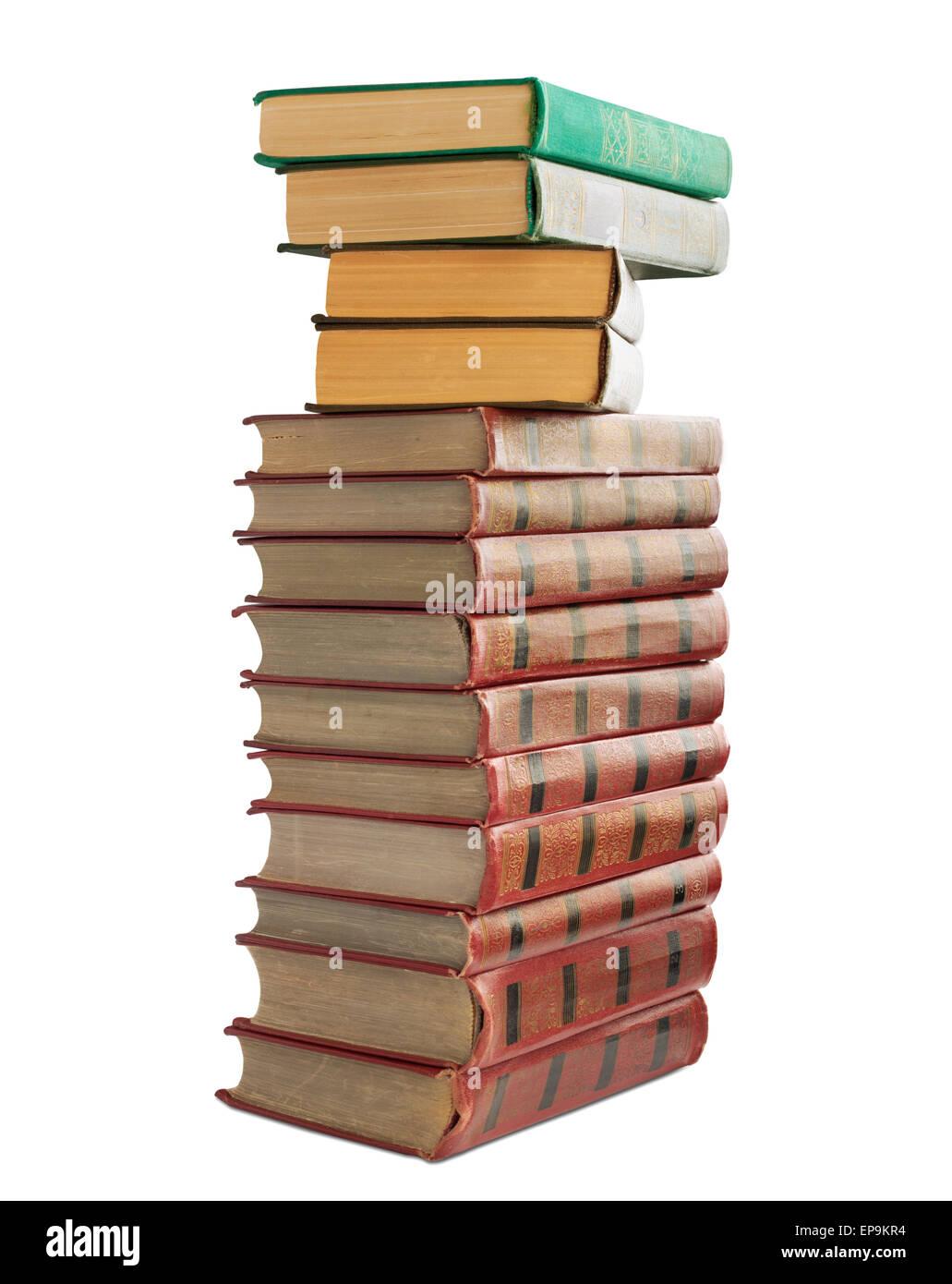 A stack of old books with gold stamping on a white background isolated ...
