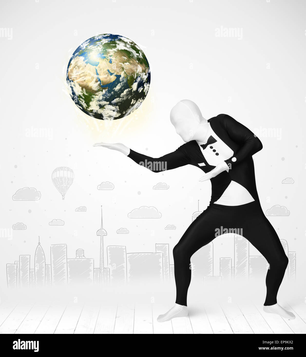 man in full body suit holding planet earth Stock Photo - Alamy