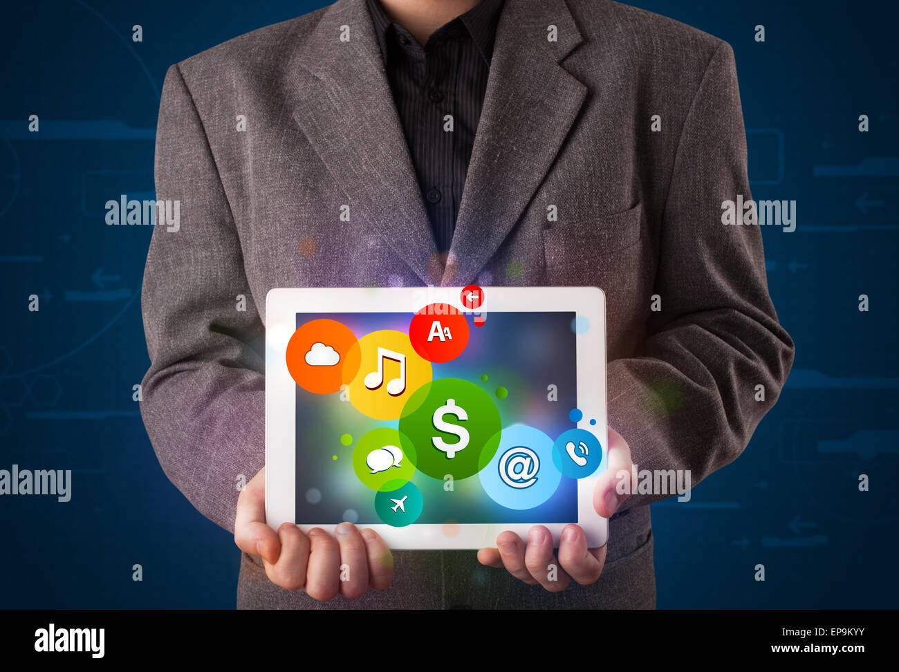 Businessman presenting colorful modern signs Stock Photo - Alamy