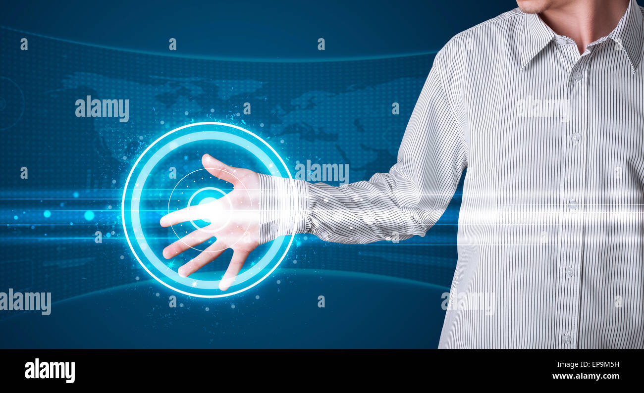 Businessman pressing high tech type of modern buttons Stock Photo - Alamy