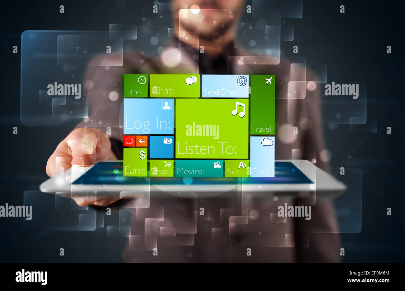 Businessman holding a tablet with modern software operational system ...