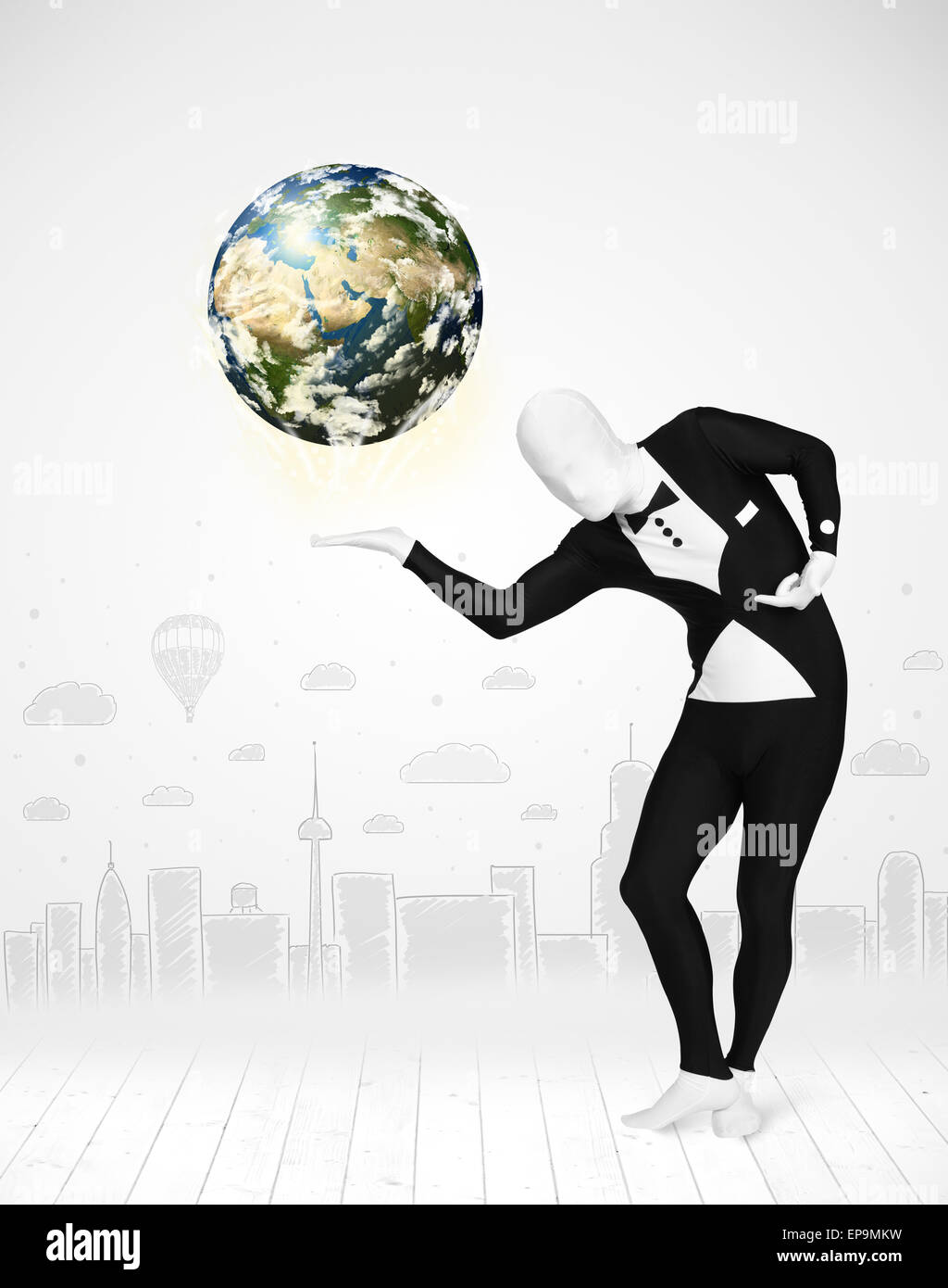 man in full body suit holding planet earth Stock Photo - Alamy