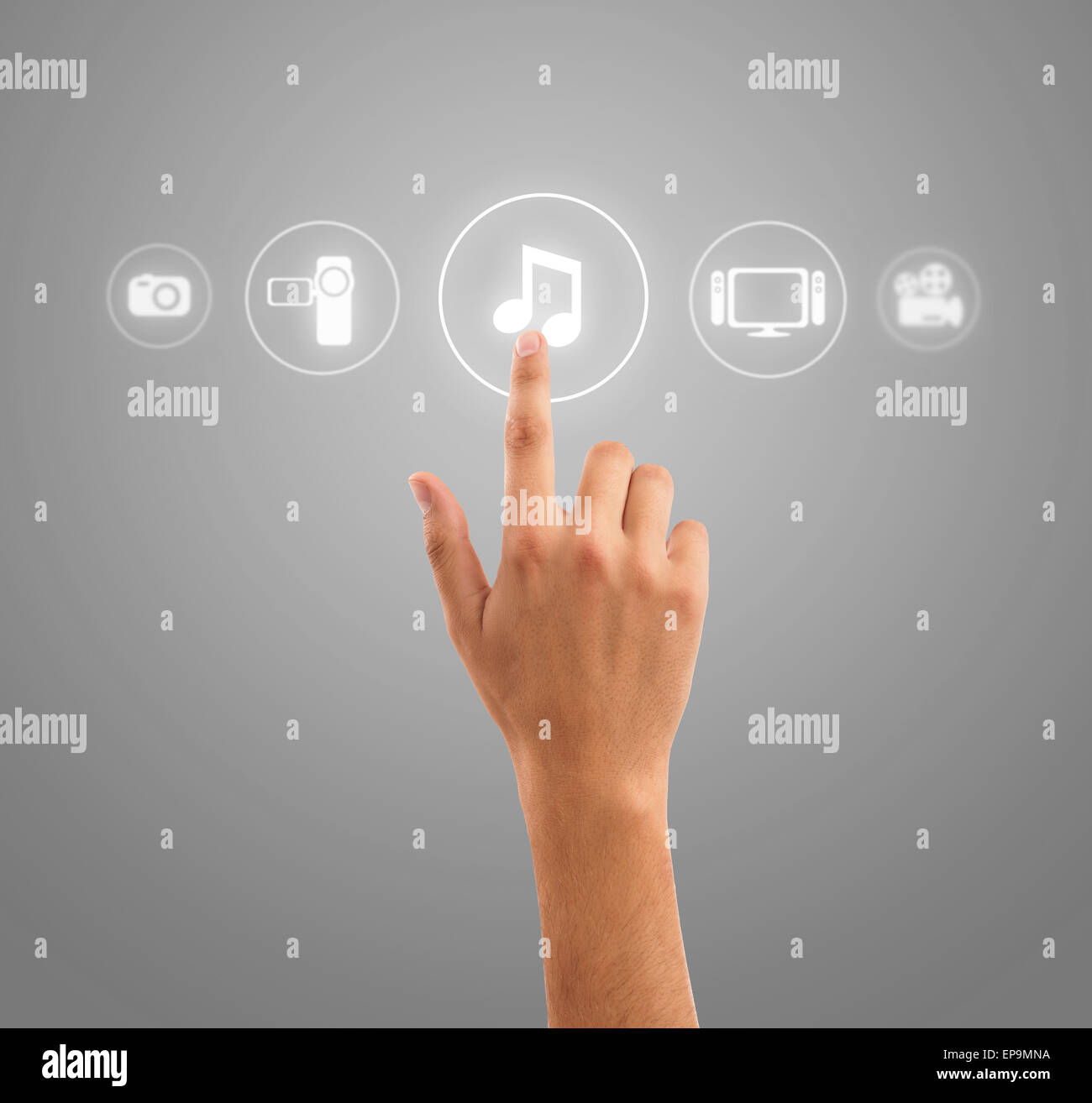 Hand pressing music note symbol from media icons Stock Photo - Alamy
