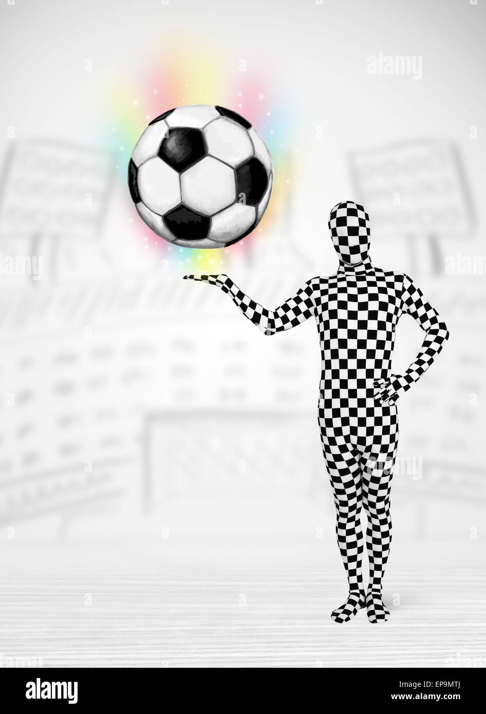man in full body suit holdig soccer ball Stock Photo - Alamy