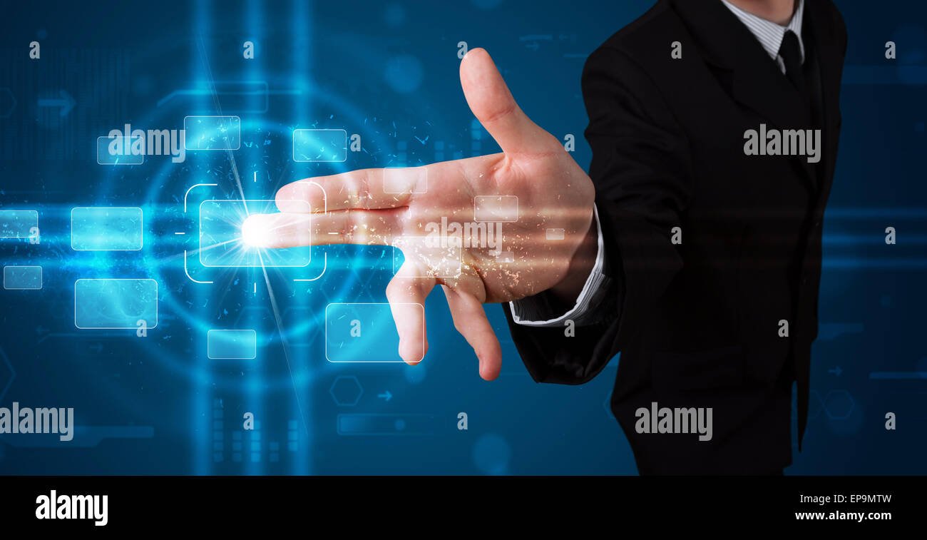 Businessman pressing high tech type of modern buttons Stock Photo - Alamy