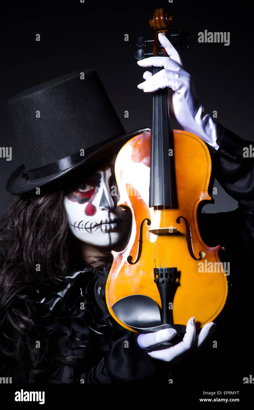 Death playing the fiddle hi-res stock photography and images - Alamy