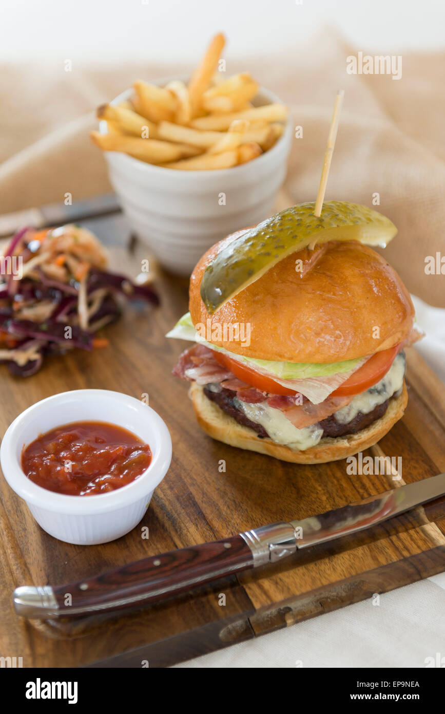 Beef burger and fries served in a bowl Stock Photo - Alamy