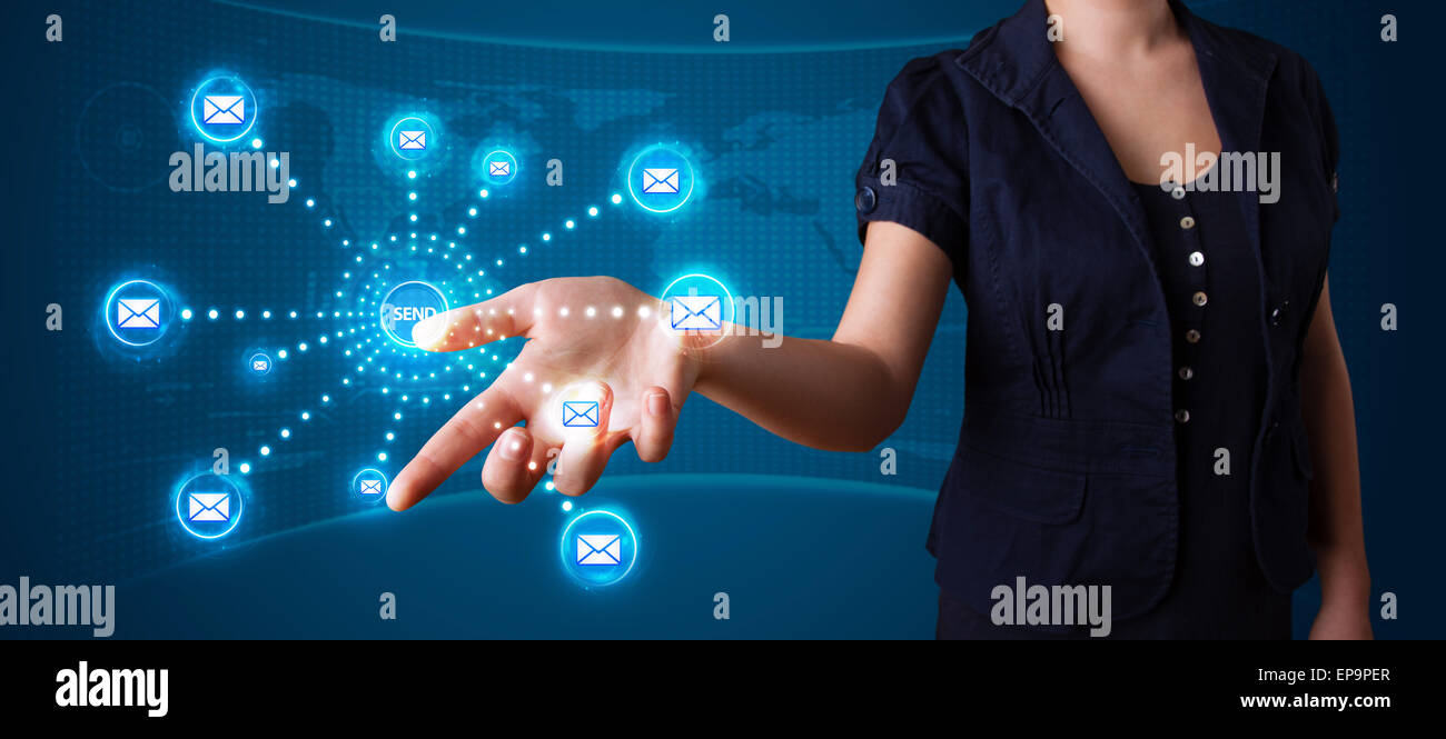 Woman pressing virtual messaging type of icons Stock Photo - Alamy