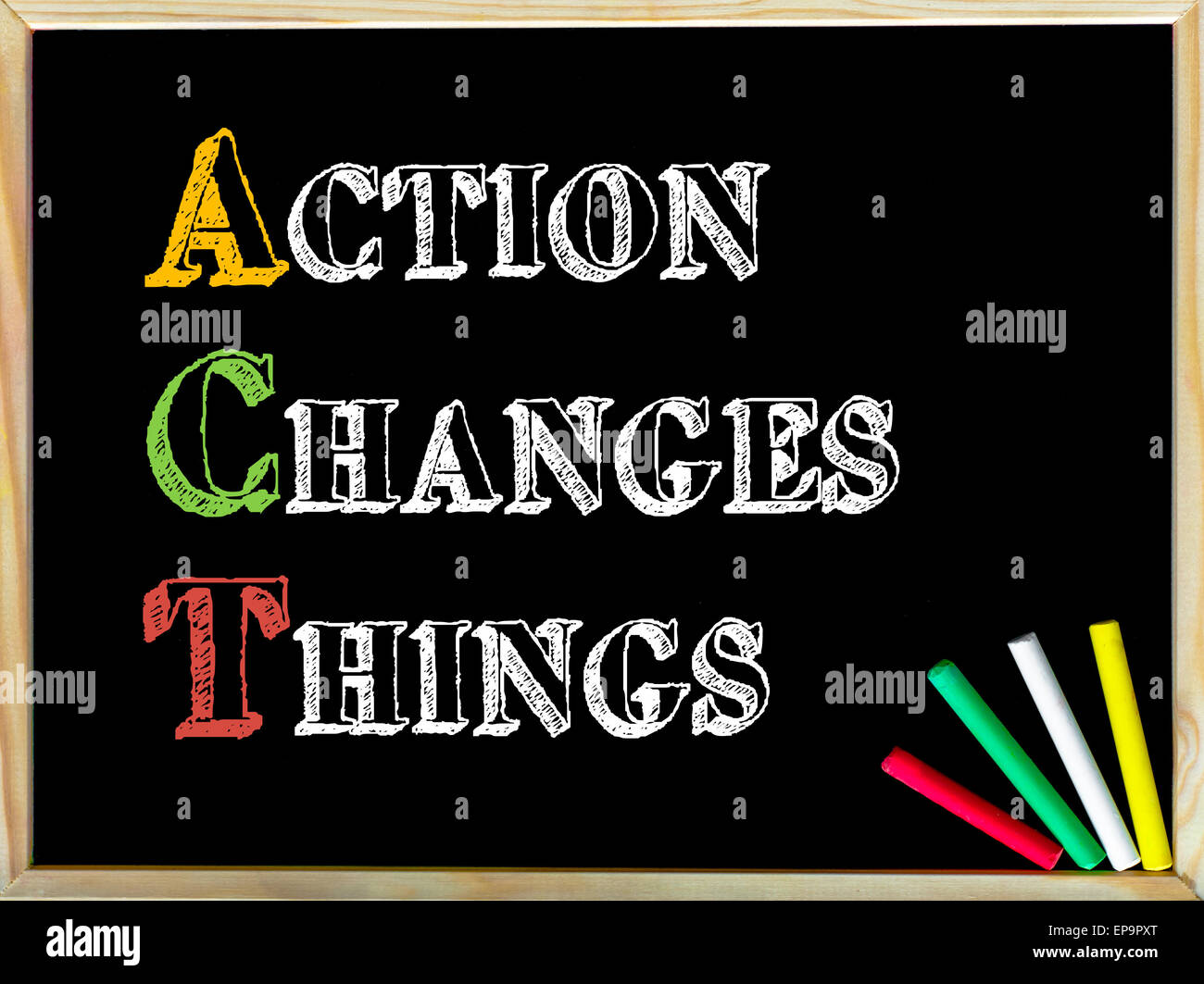 Acronym ACT as Action Changes Things. Written note on wooden frame ...