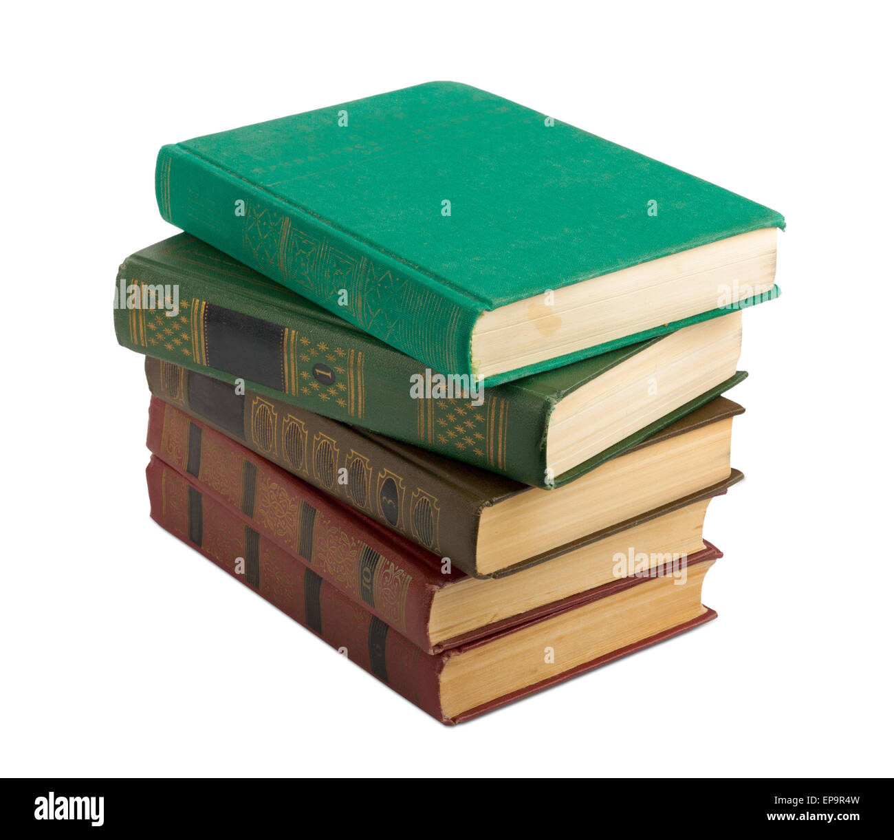 A stack of old books with gold stamping on a white background isolated ...