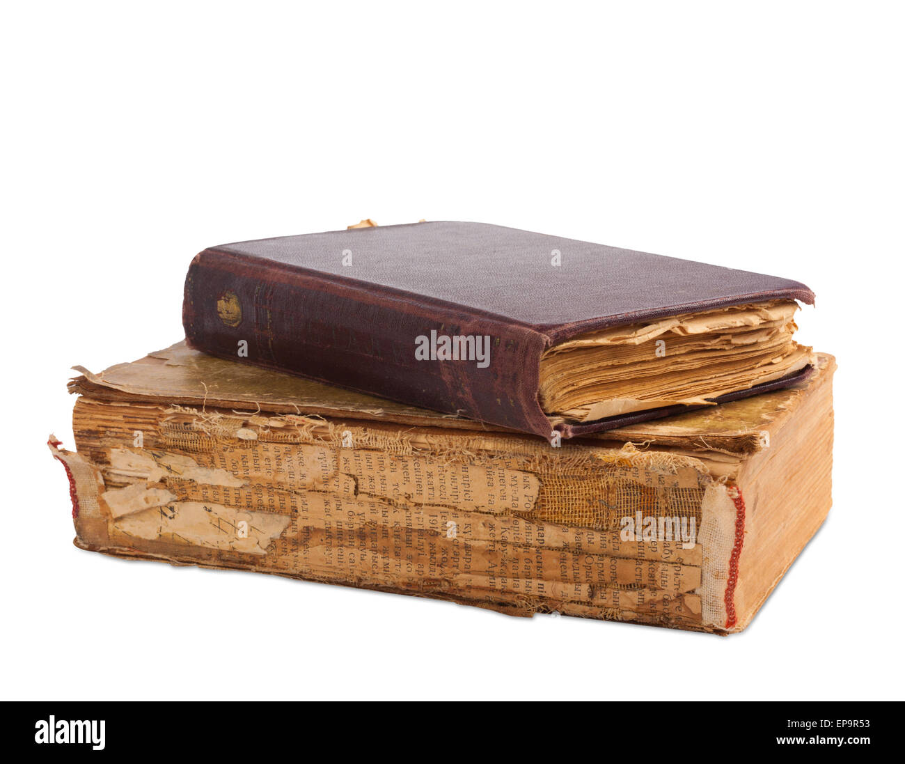 A stack of old books with gold stamping on a white background isolated ...