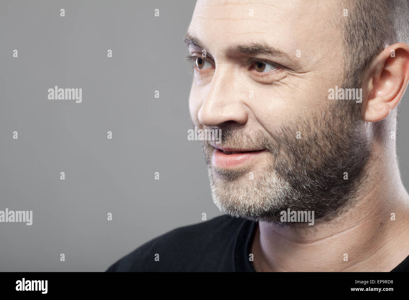man looking to the left isolated on gray Stock Photo - Alamy