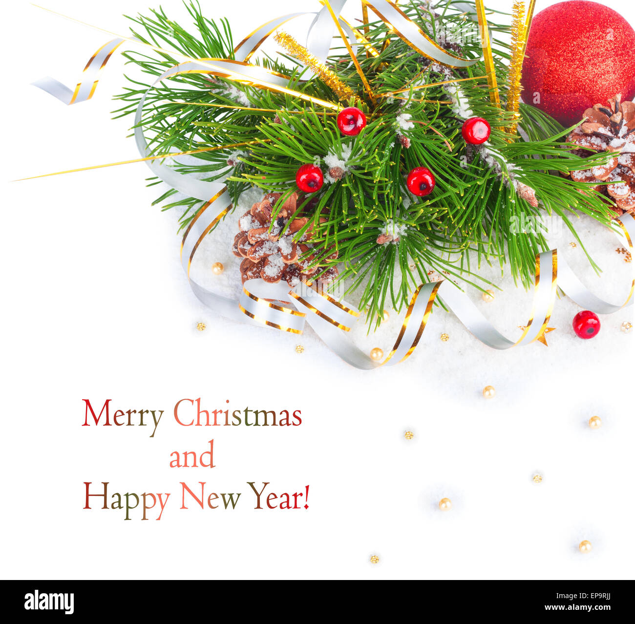 Christmas tree branch with gold serpentine and red sphere on white ...