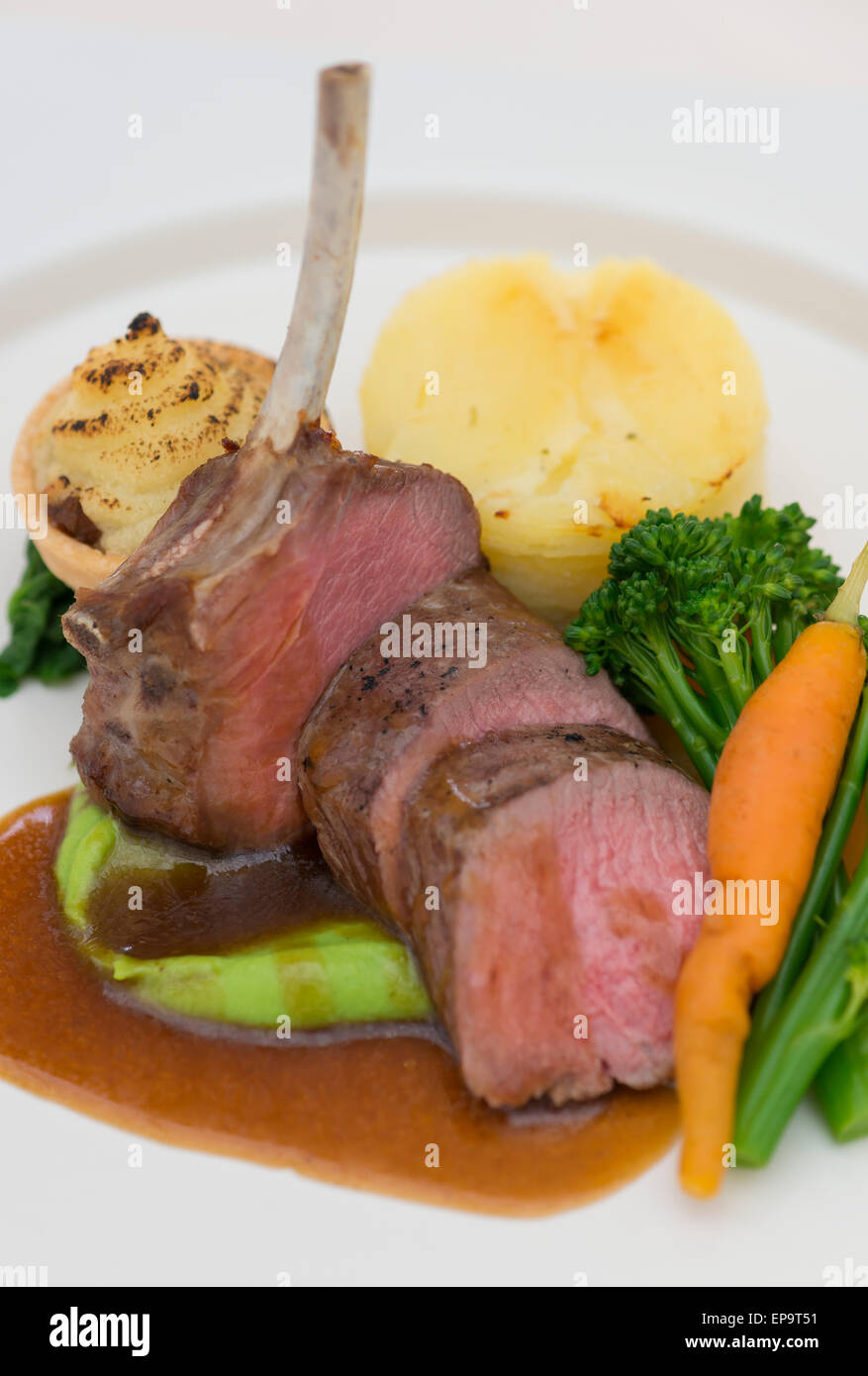 Duo of Lamb served with seasonal vegetables Stock Photo - Alamy