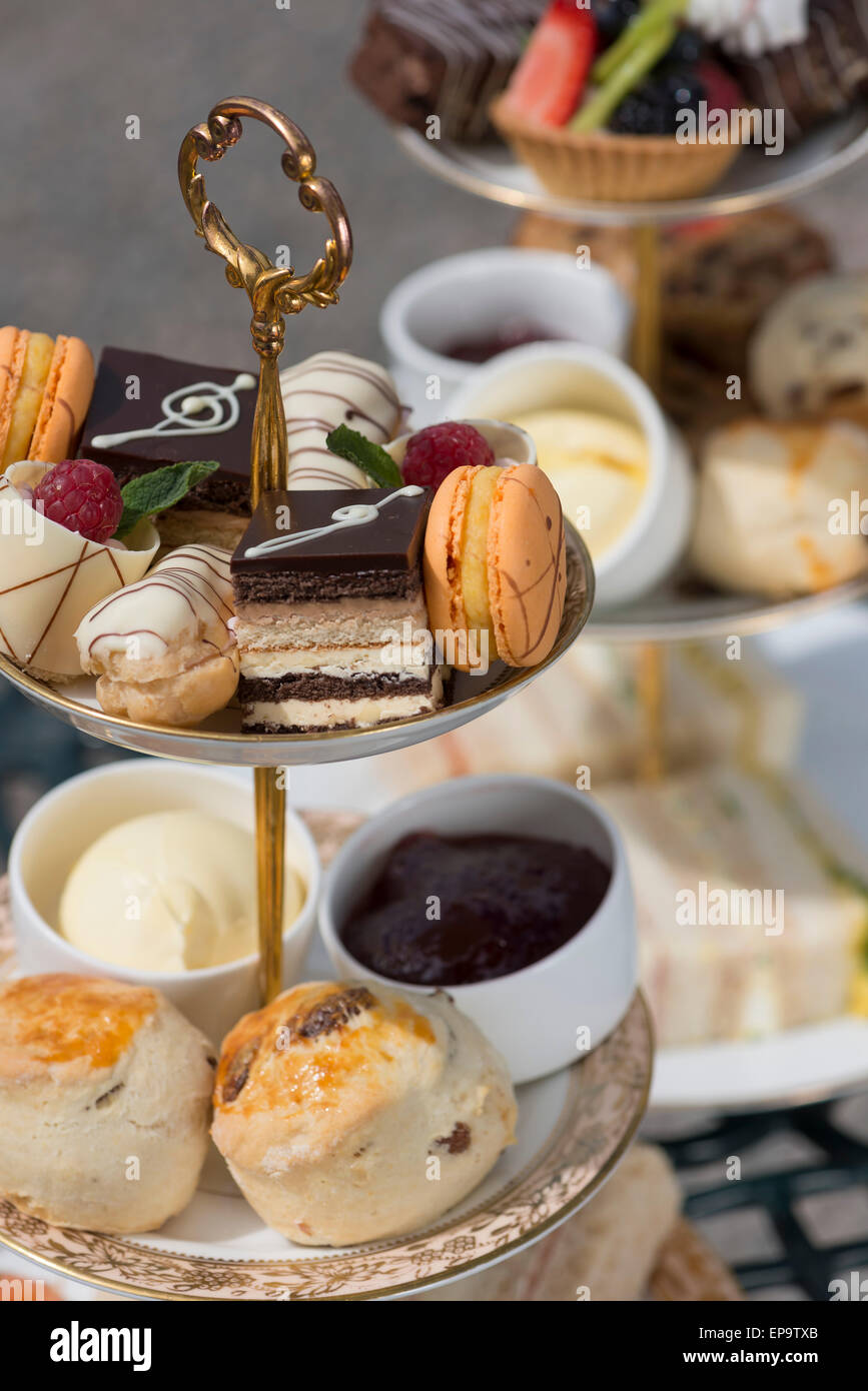 Afternoon tea with cakes, scones and finger sandwiches Stock Photo - Alamy