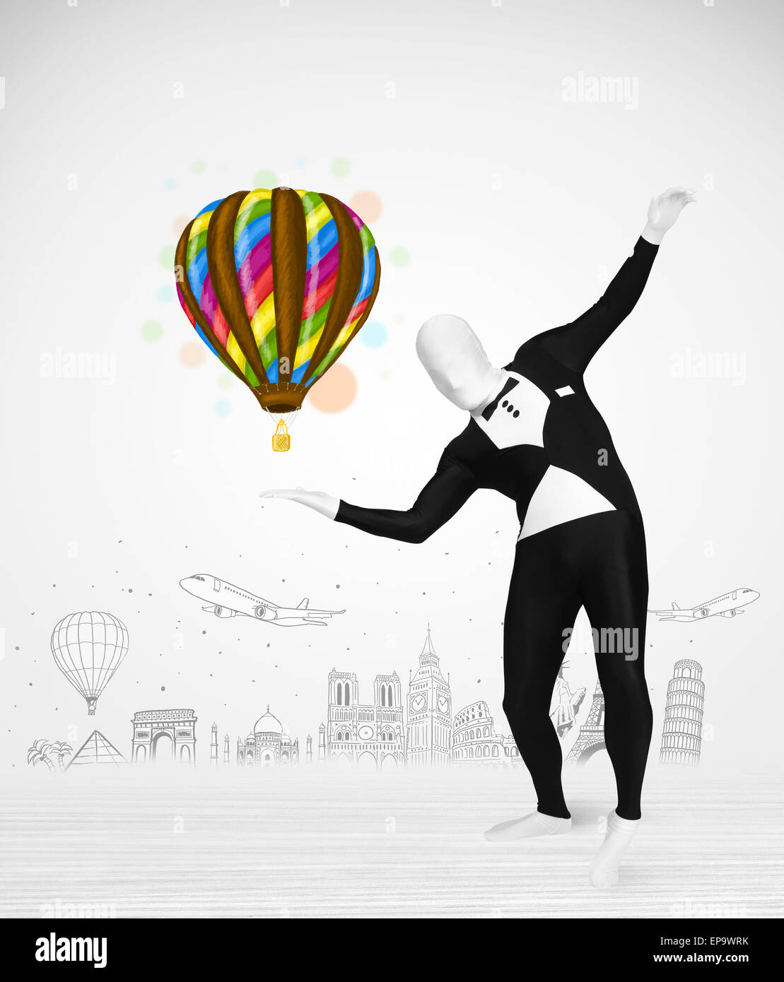 man in full body suit holding balloon Stock Photo - Alamy