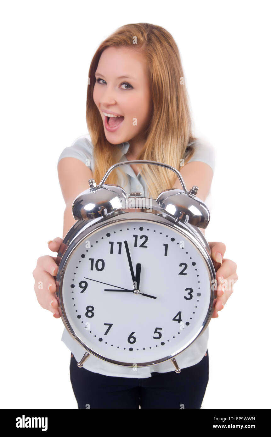 Young woman with clock on white Stock Photo - Alamy