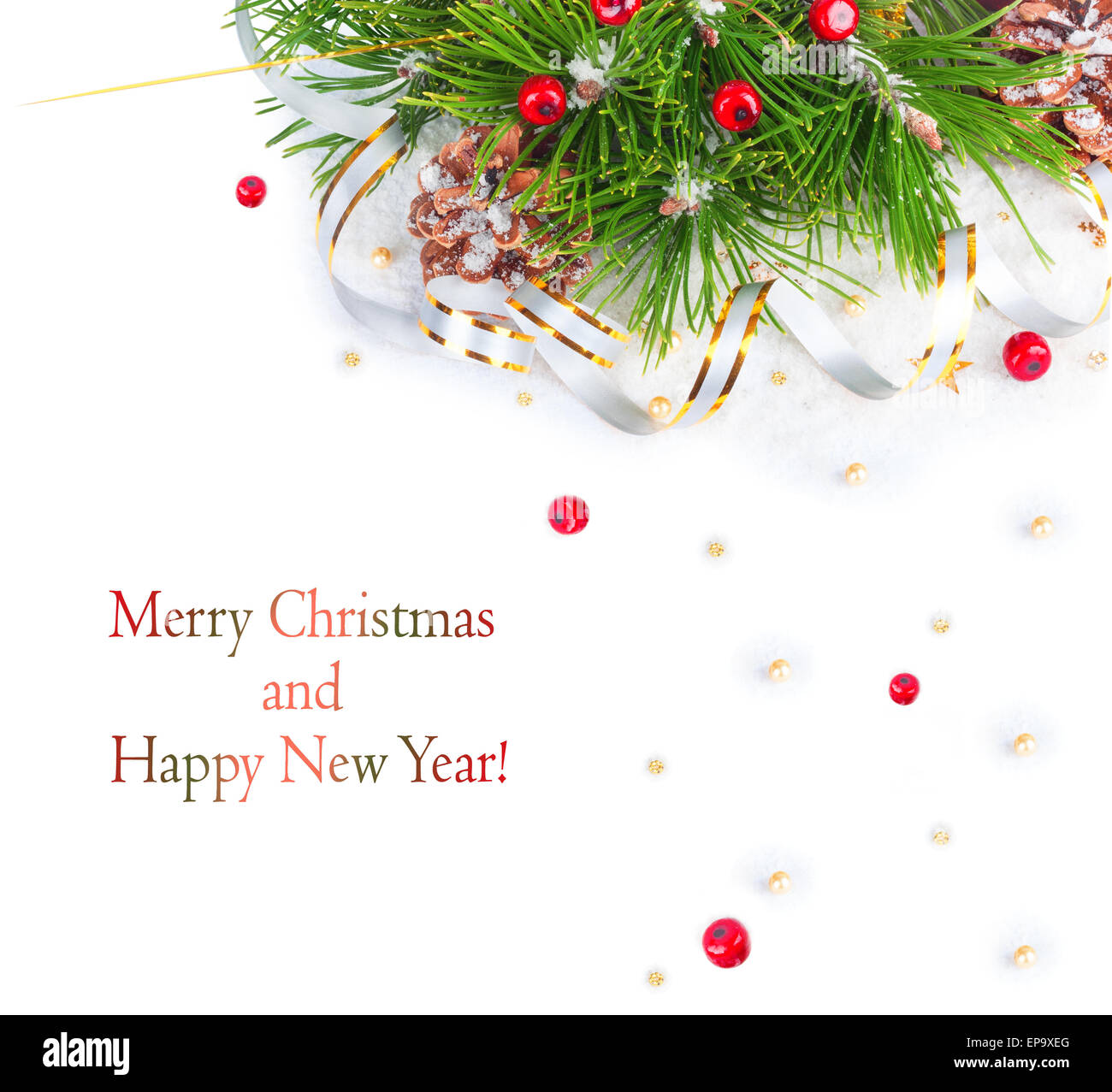 Christmas tree branch with gold serpentine and red sphere on white ...