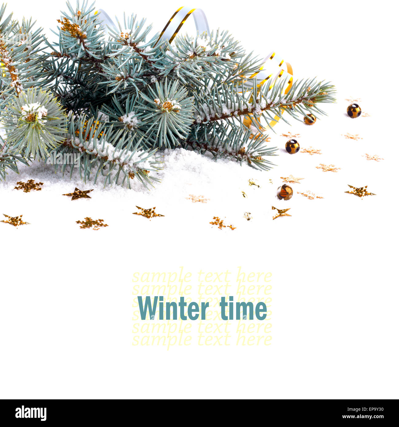 Christmas fir branch with gold streamers and stars on a white ...