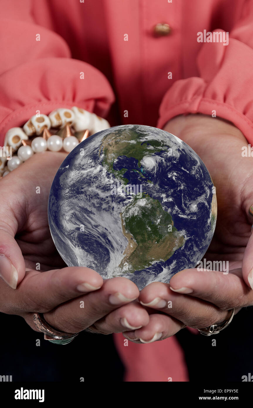 Woman holding Earth Stock Photo - Alamy