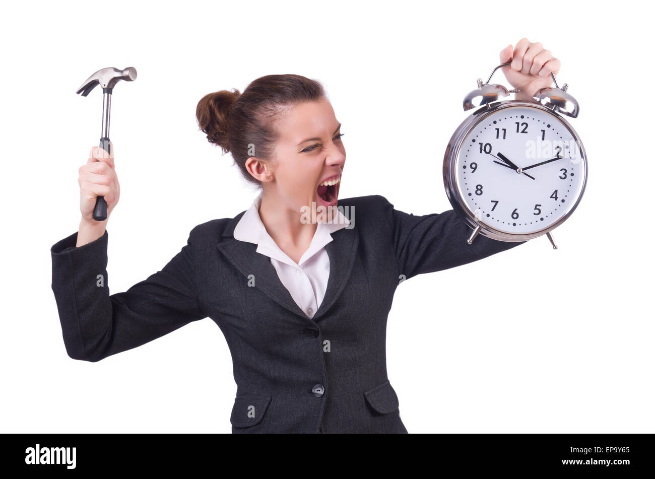 Woman trying to break the clock Stock Photo - Alamy