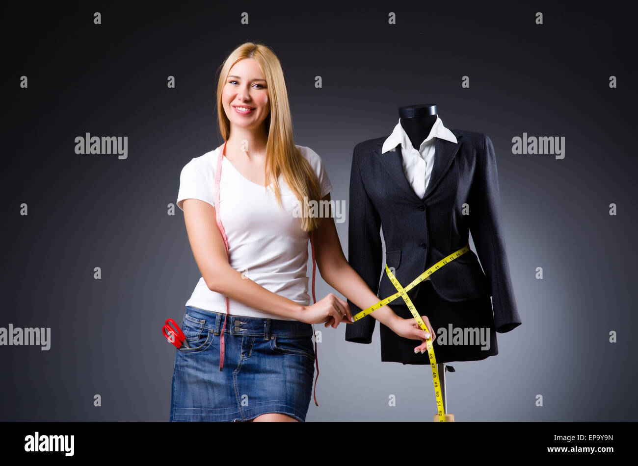 Young tailor isolated on the white Stock Photo - Alamy