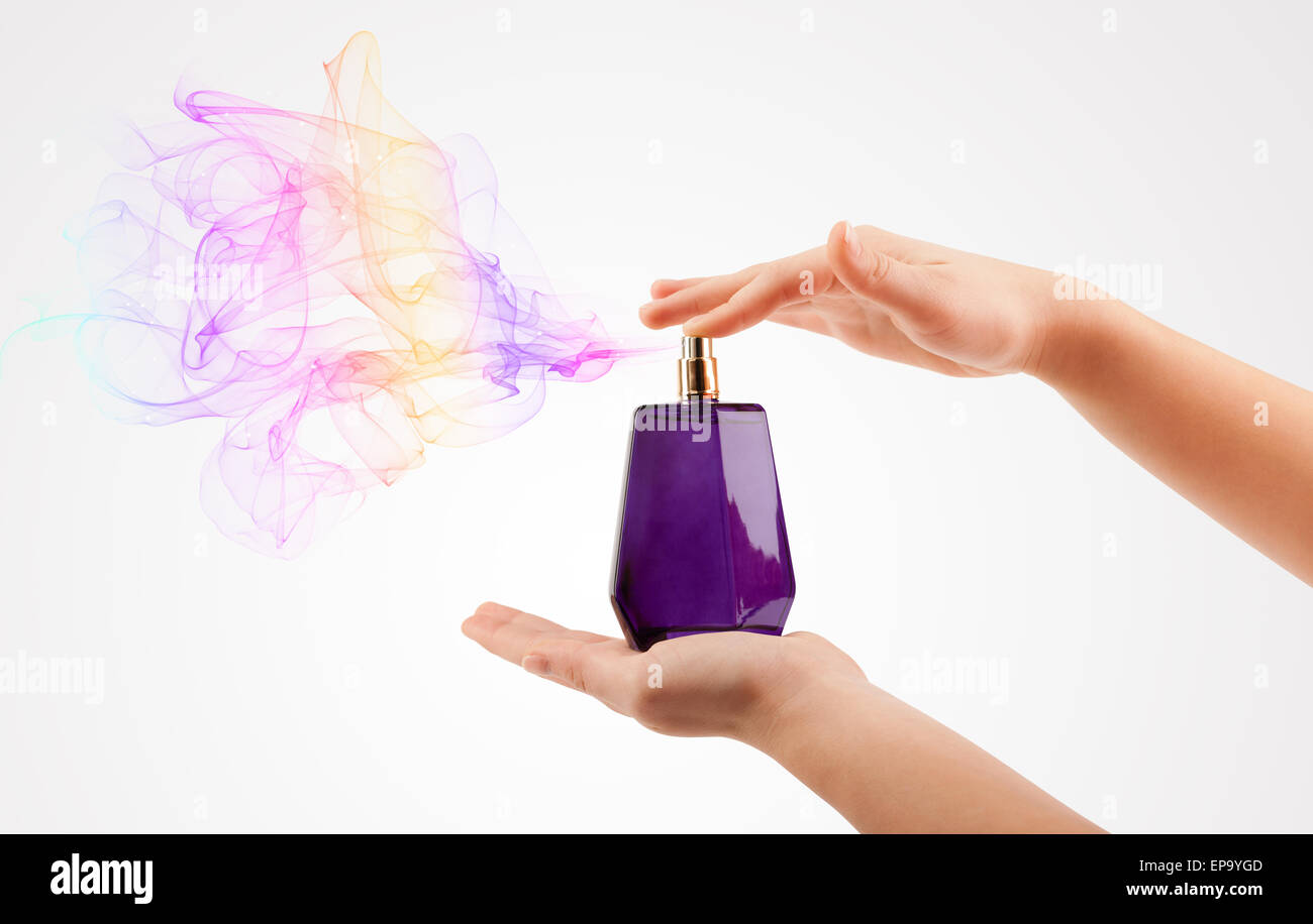 woman hands spraying perfume Stock Photo - Alamy