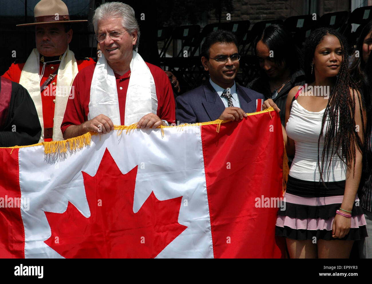 Toronto, Canada: immigrants swearing as new Canadian citizen at a ...
