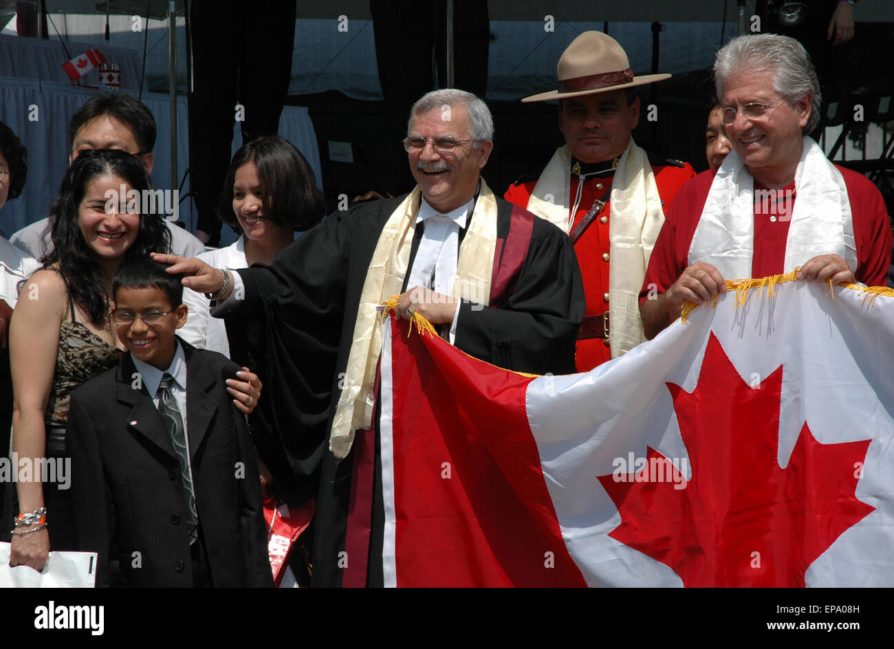 Toronto, Canada: immigrants swearing as new Canadian citizen at a ...