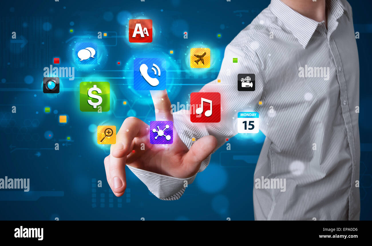 Man pressing various collection of high tech buttons Stock Photo - Alamy