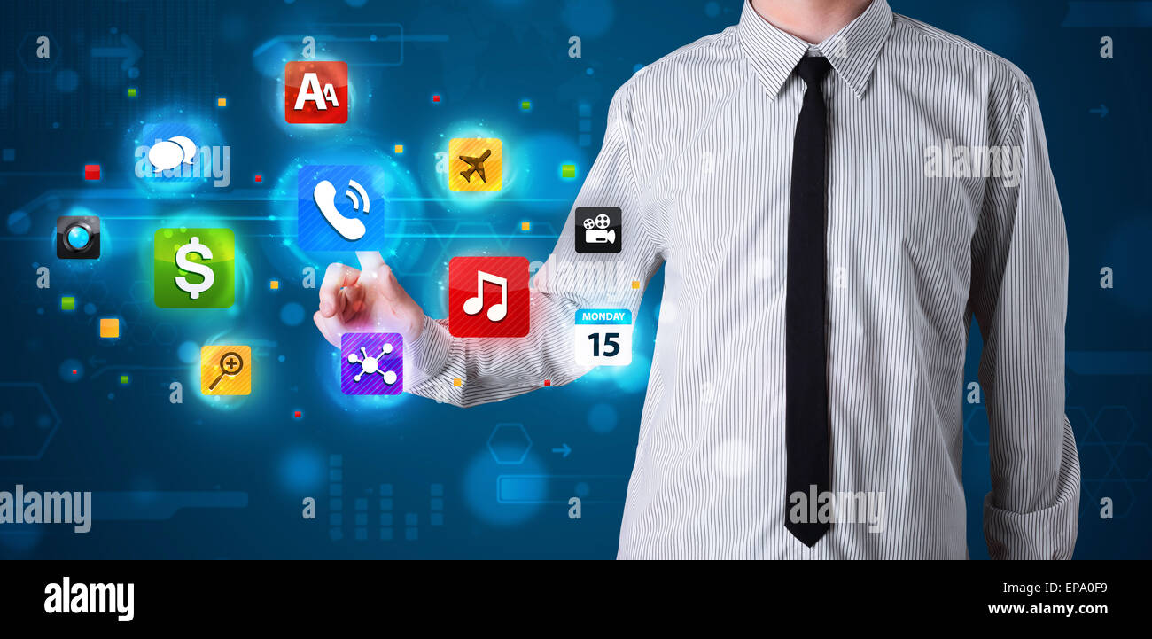 Businessman pressing various collection of buttons Stock Photo - Alamy