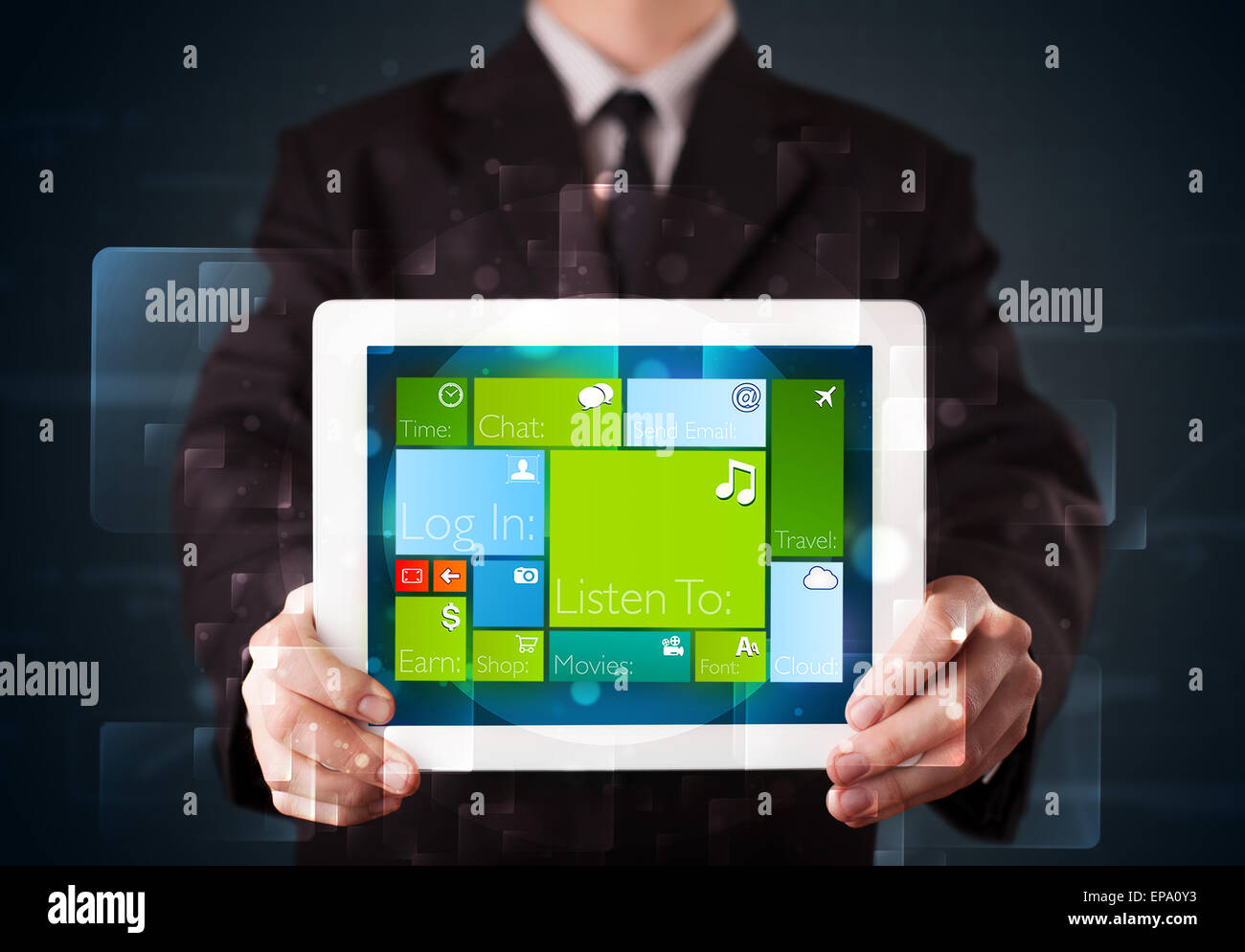 Businessman holding a tablet with modern software operational system ...