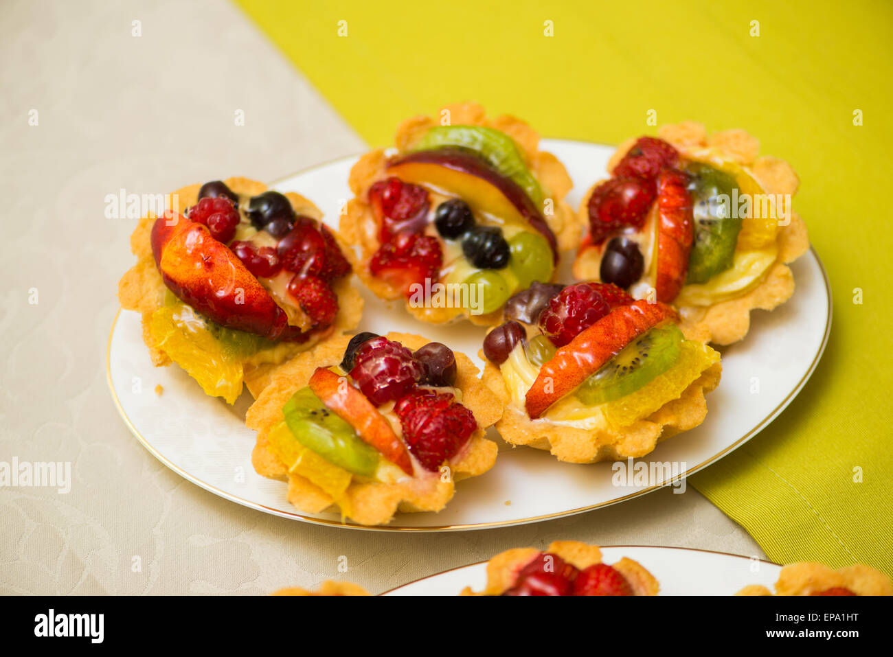 Tasty sweets in the plate Stock Photo - Alamy