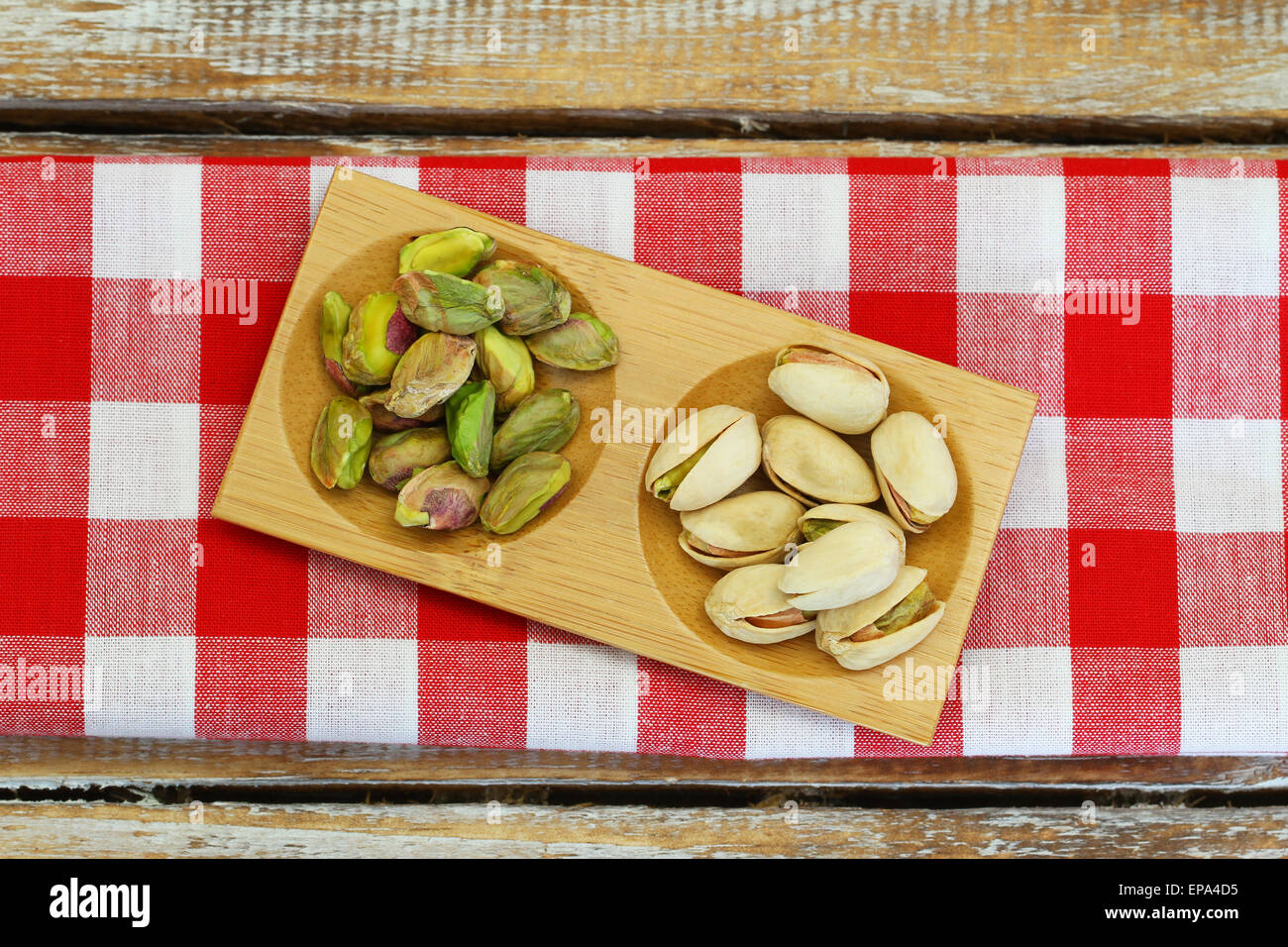 Pistachio nuts with and without shell hi-res stock photography and ...