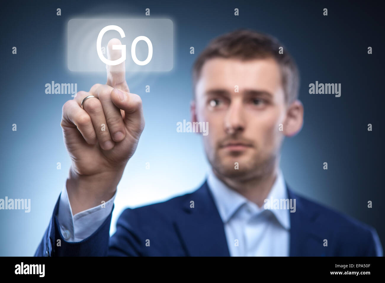 business man pressing Go button on touchscreen Stock Photo - Alamy
