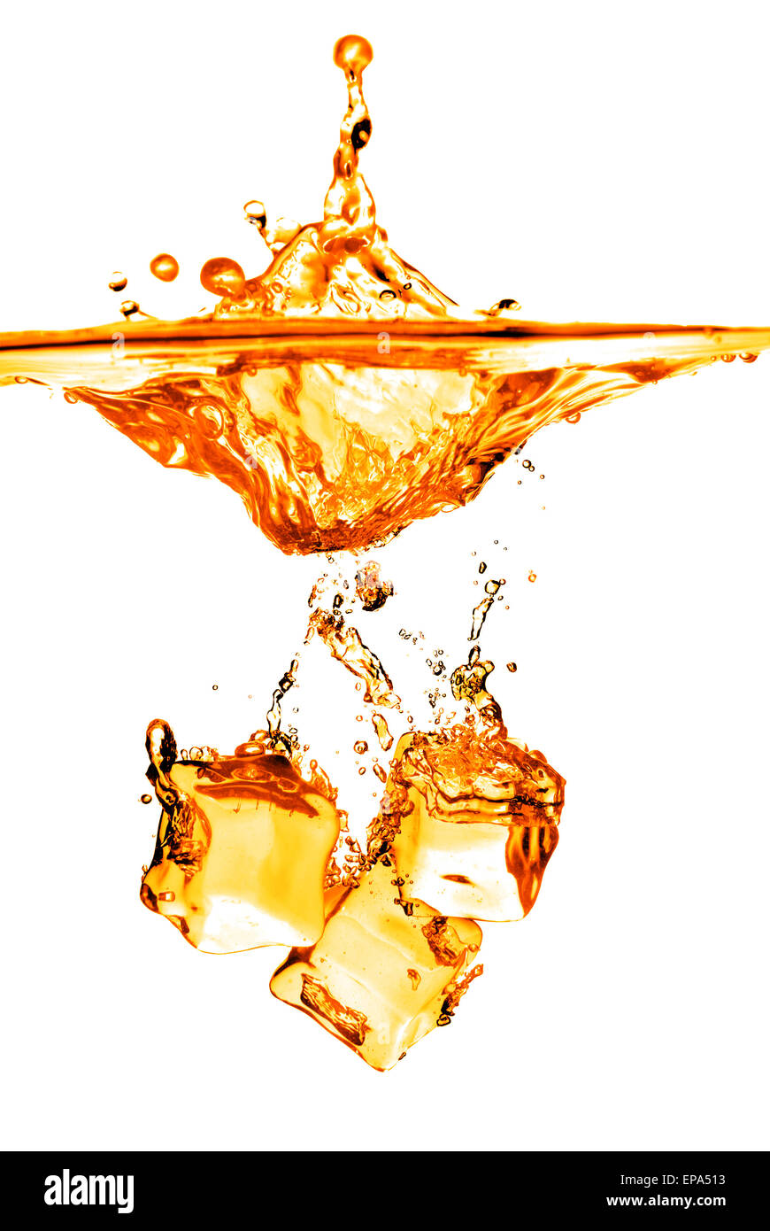 ice cubes dropped into orange water with splash isolated on white Stock Photo - Alamy