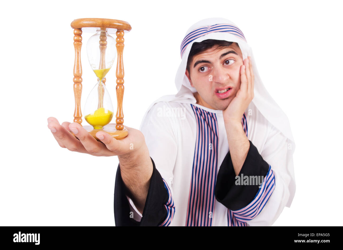 Arab man thinking about passage of time Stock Photo - Alamy