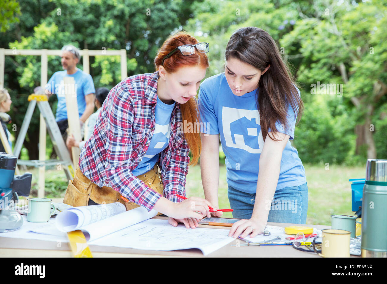volunteering blueprint construction site Stock Photo - Alamy
