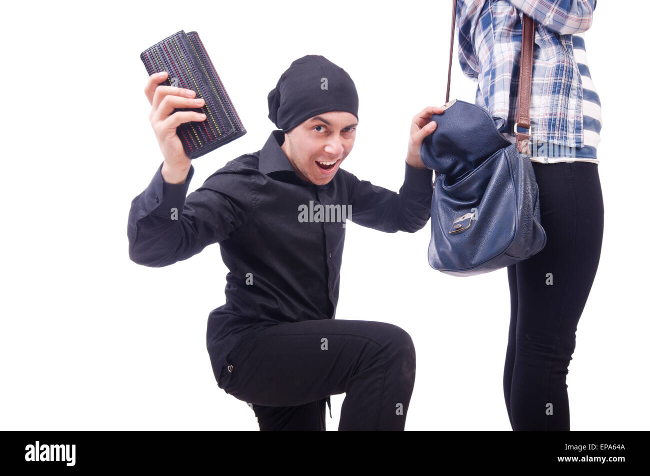 Young thief stealing woman's bag Stock Photo - Alamy