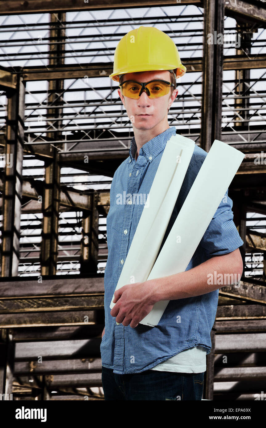 Construction Worker with Blueprints Stock Photo - Alamy