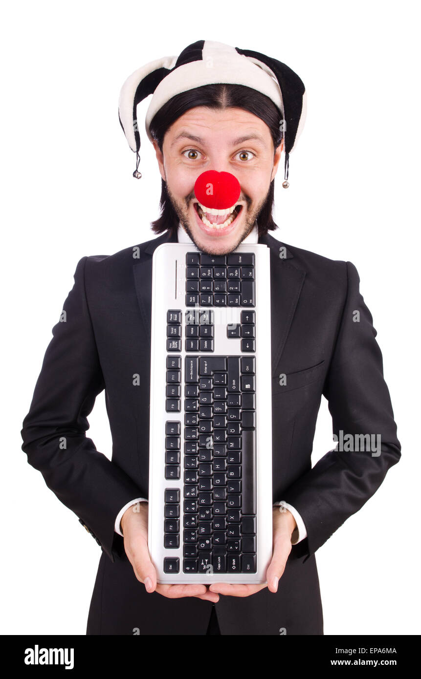 Funny clown with keyboard isolated on white Stock Photo - Alamy