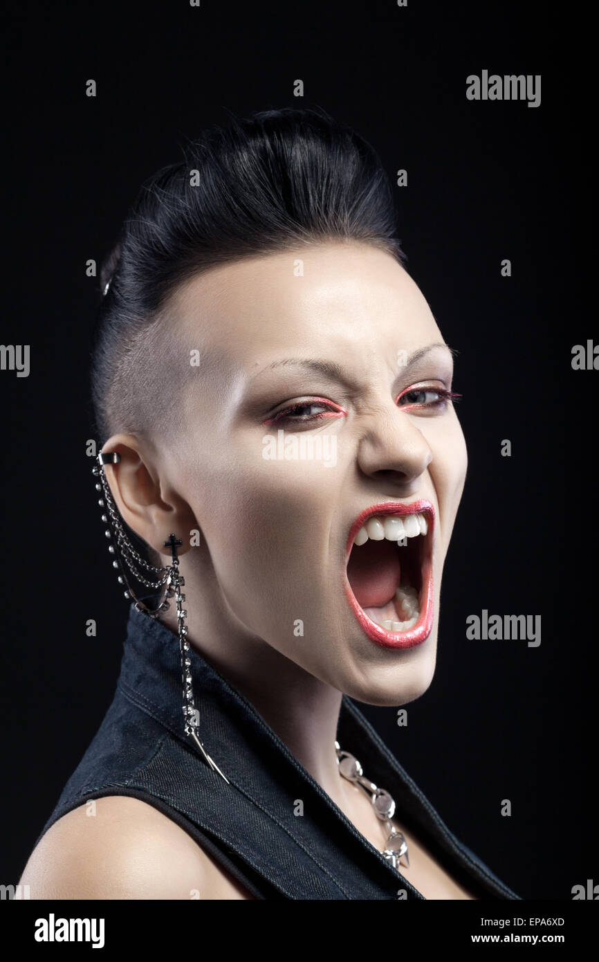 portrait of angry young woman screaming isolated Stock Photo - Alamy